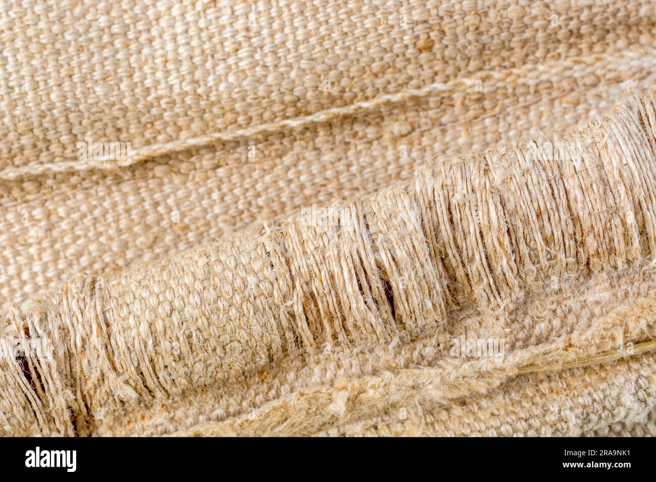 Close-up shot of worn seat fabric - appears to be mixed fibre not 100% ...