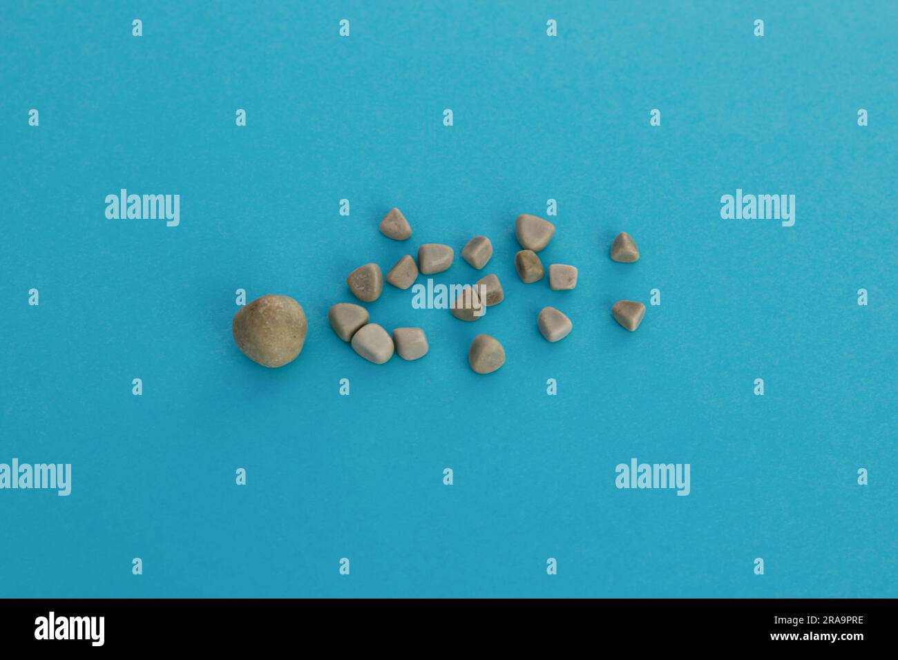 Gallbladder stones close up on blue background Stock Photo - Alamy