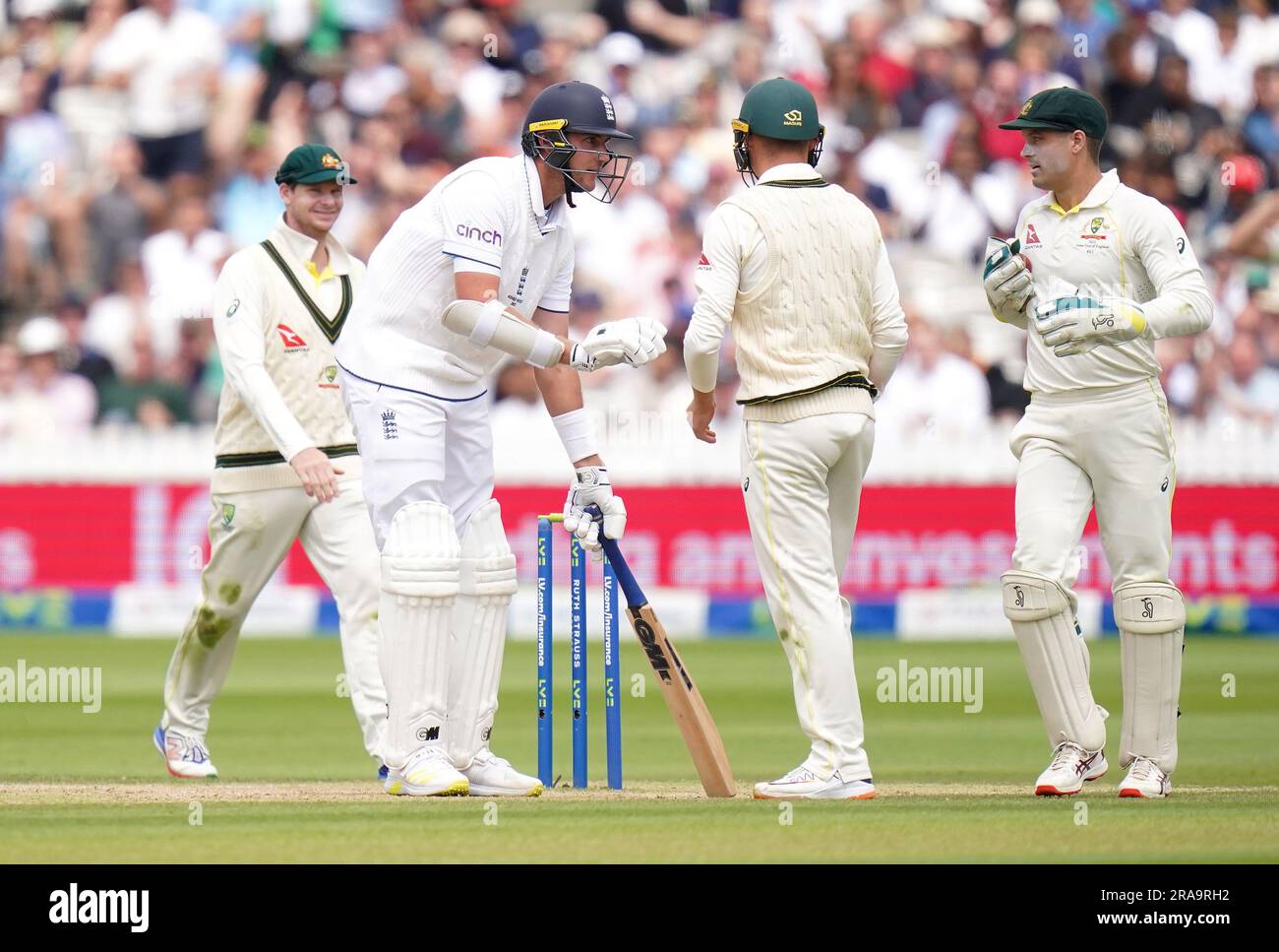 England's Stuart Broad grounds his bat as Australia's Marnus ...