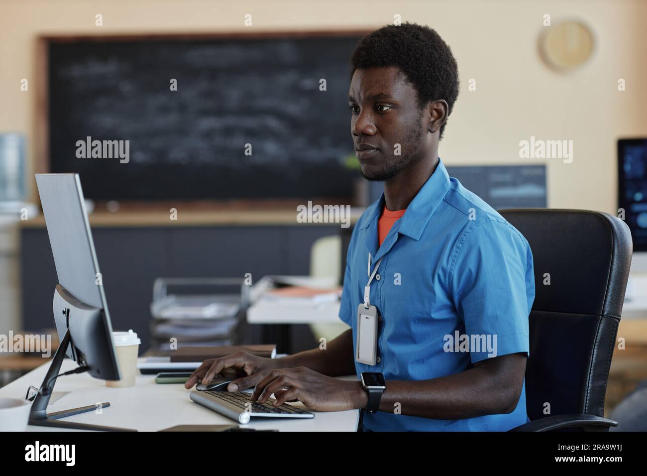 Young programmer concentrating on creative work or new project while ...