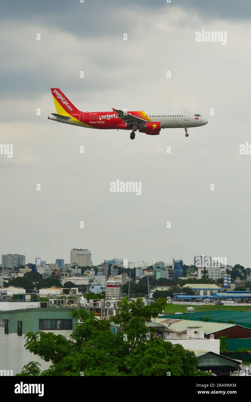 Saigon, Vietnam - Jun 28, 2023. VN-A666 VietJetAir Airbus A320 landing ...
