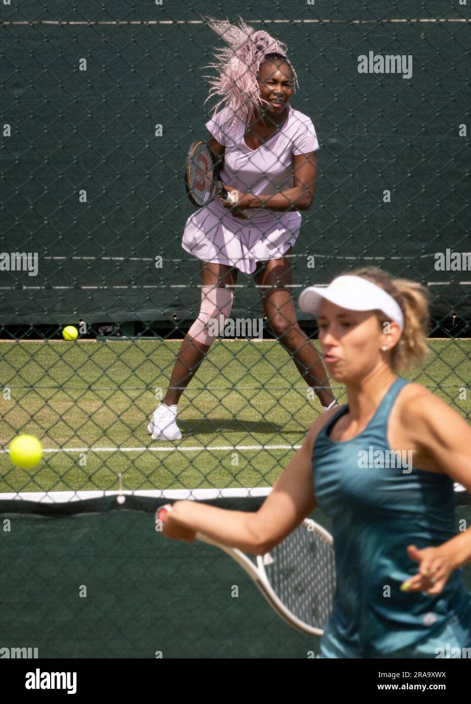 London, UK. 02nd July, 2023. Belgian Elise Mertens trains next to Venus ...