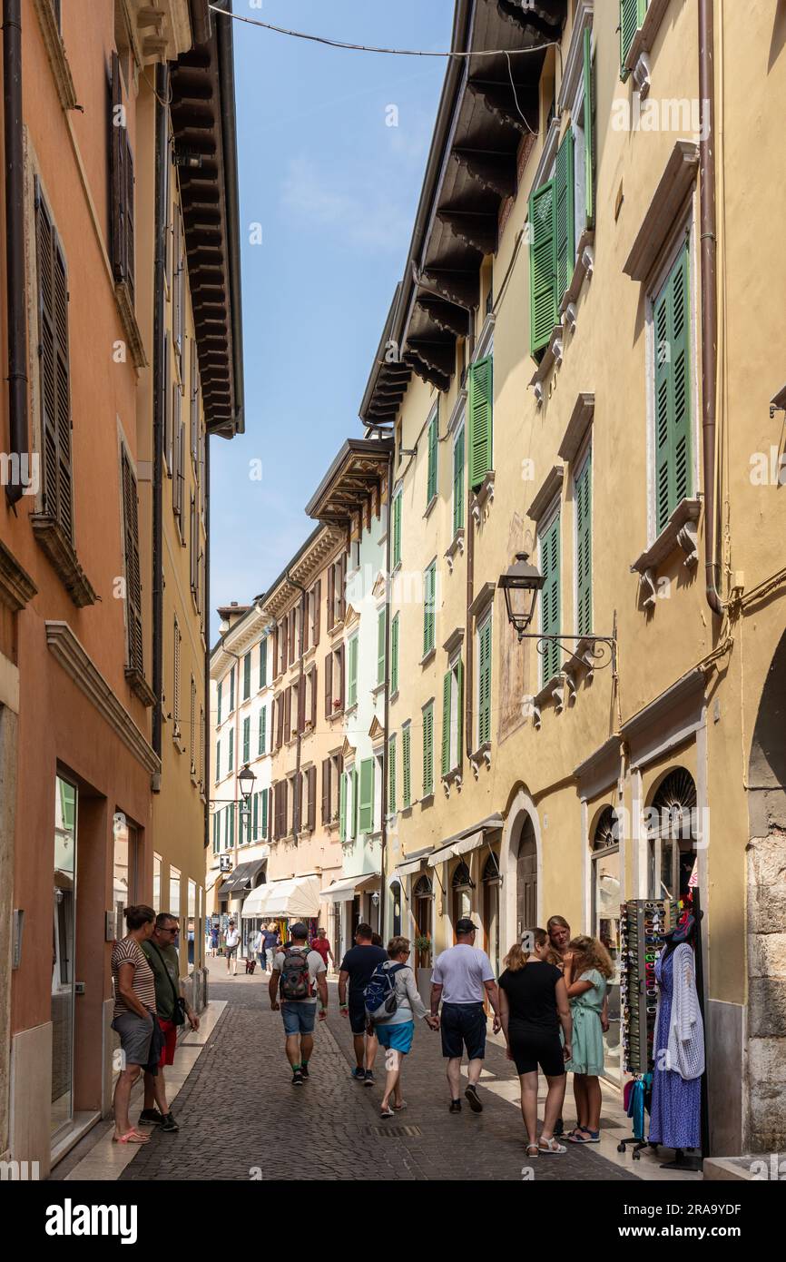 A picturesque colourful street in Salo town, Salo, Lake Garda, Italy ...