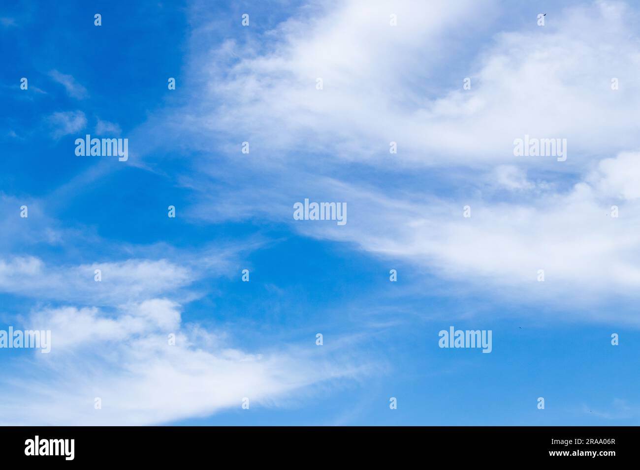 Clear blue color sky with white cloud background Stock Photo - Alamy