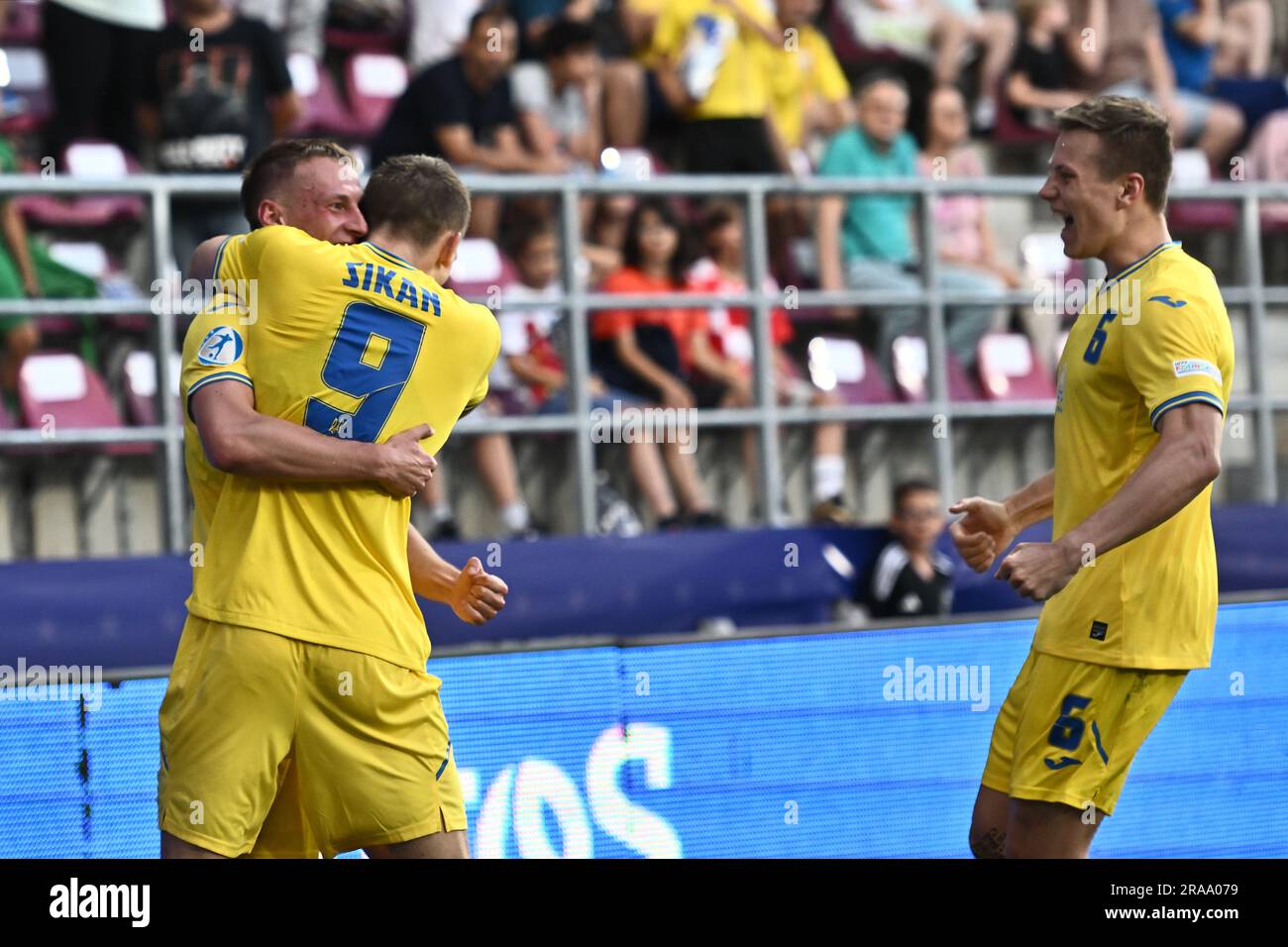 BUCHAREST, ROMANIA - JUNE 21: Volodymyr Brazhko, Danylo Sikan, Oleksii Sych of Ukraine celebrate ...