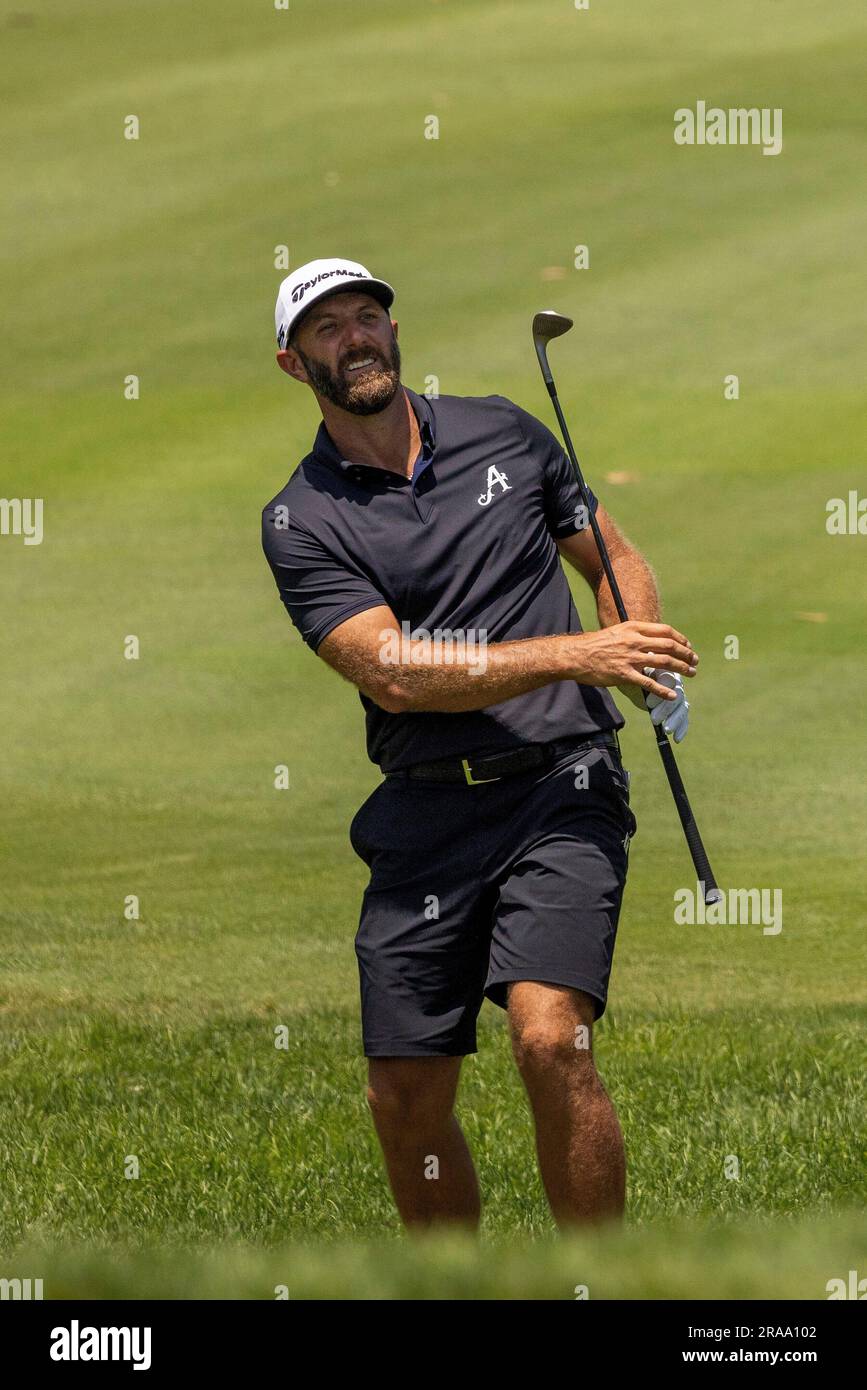 Captain Dustin Johnson of 4Aces GC chips to the seventh green during ...