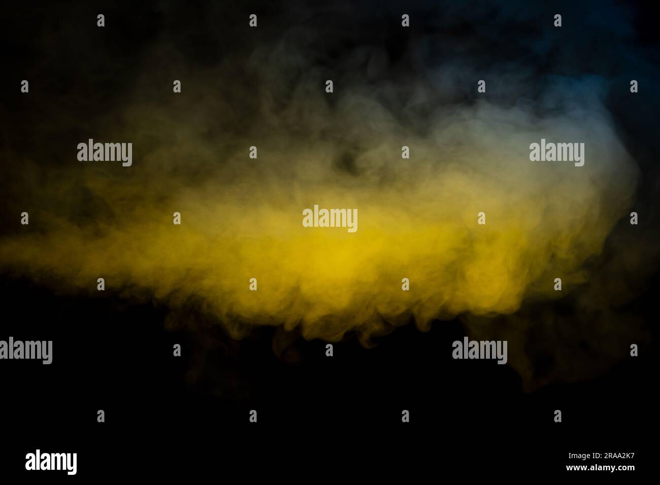 Blue and yellow steam on a black background. Copy space Stock Photo - Alamy