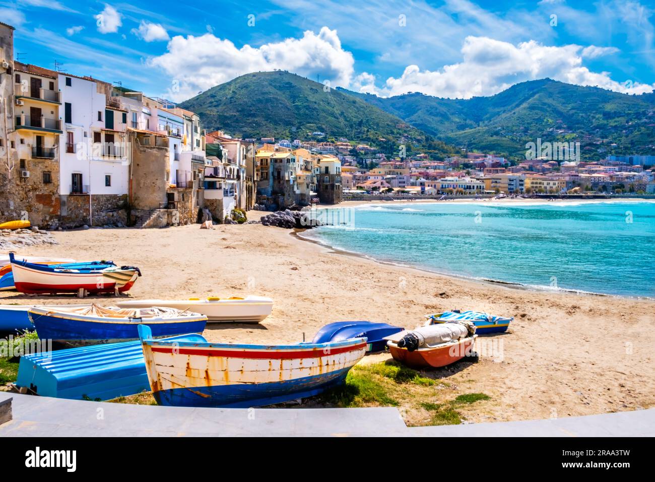 Fishing boats on beach of Cefalu, medieval town on Sicily island, Italy ...