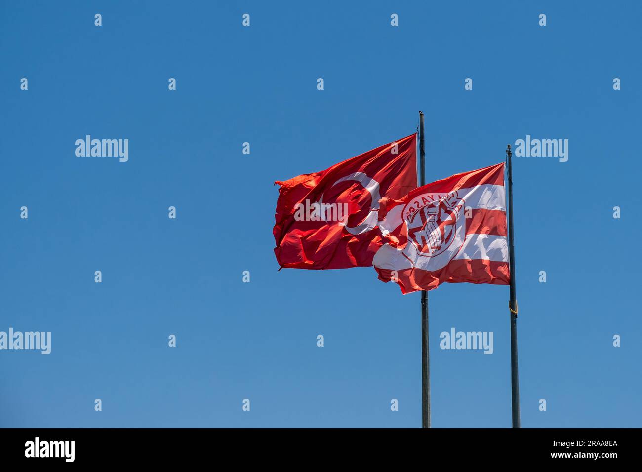 Turkish flag waving in the sky, in front of a blue background Stock ...