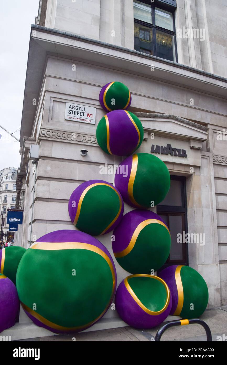 London, England, UK. 2nd July, 2023. Giant Wimbledon-themed tennis ...
