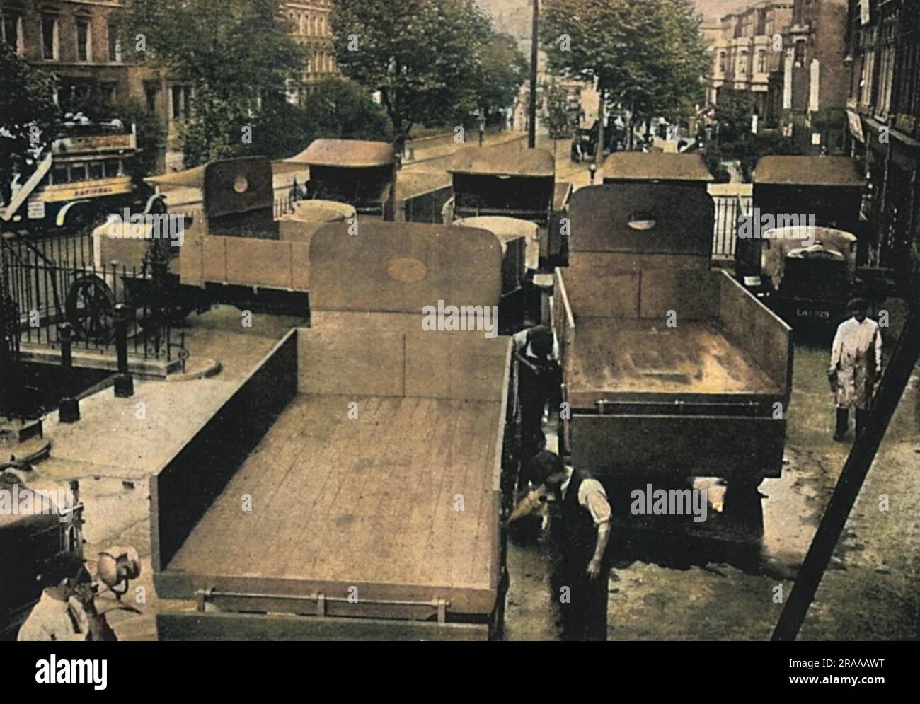 With the outbreak of war, London motor buses are adapted for army use ...