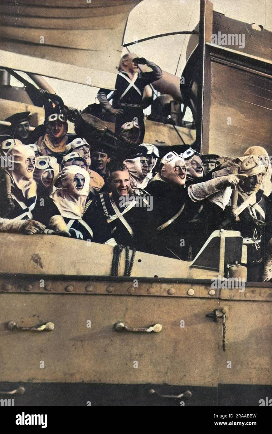 British sailors, the crew of a gun-ship, with gas masks at the ready in ...
