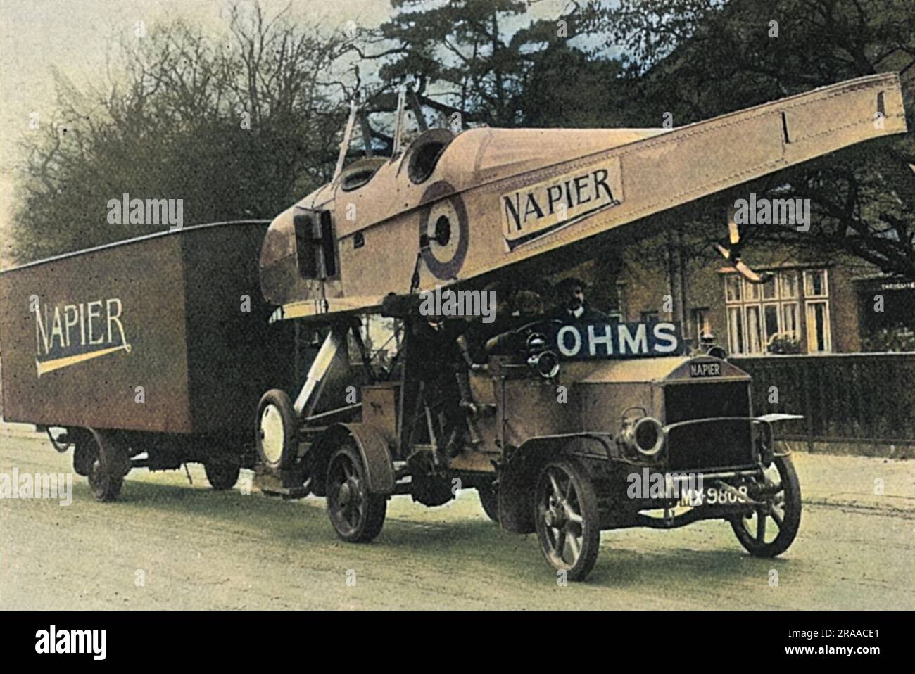 A Napier aeroplane en route to the army authorities, towed by a car ...