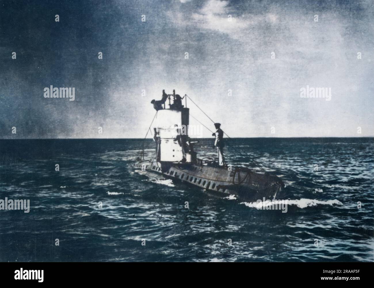An Austrian submarine on the surface, with crew members, during the ...