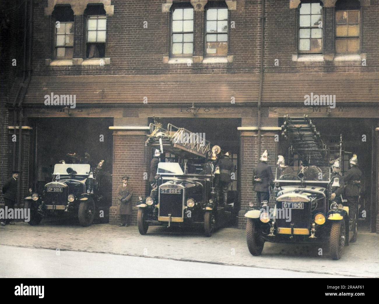 Turnout of fire appliances and crew on a fire station forecourt. Date ...