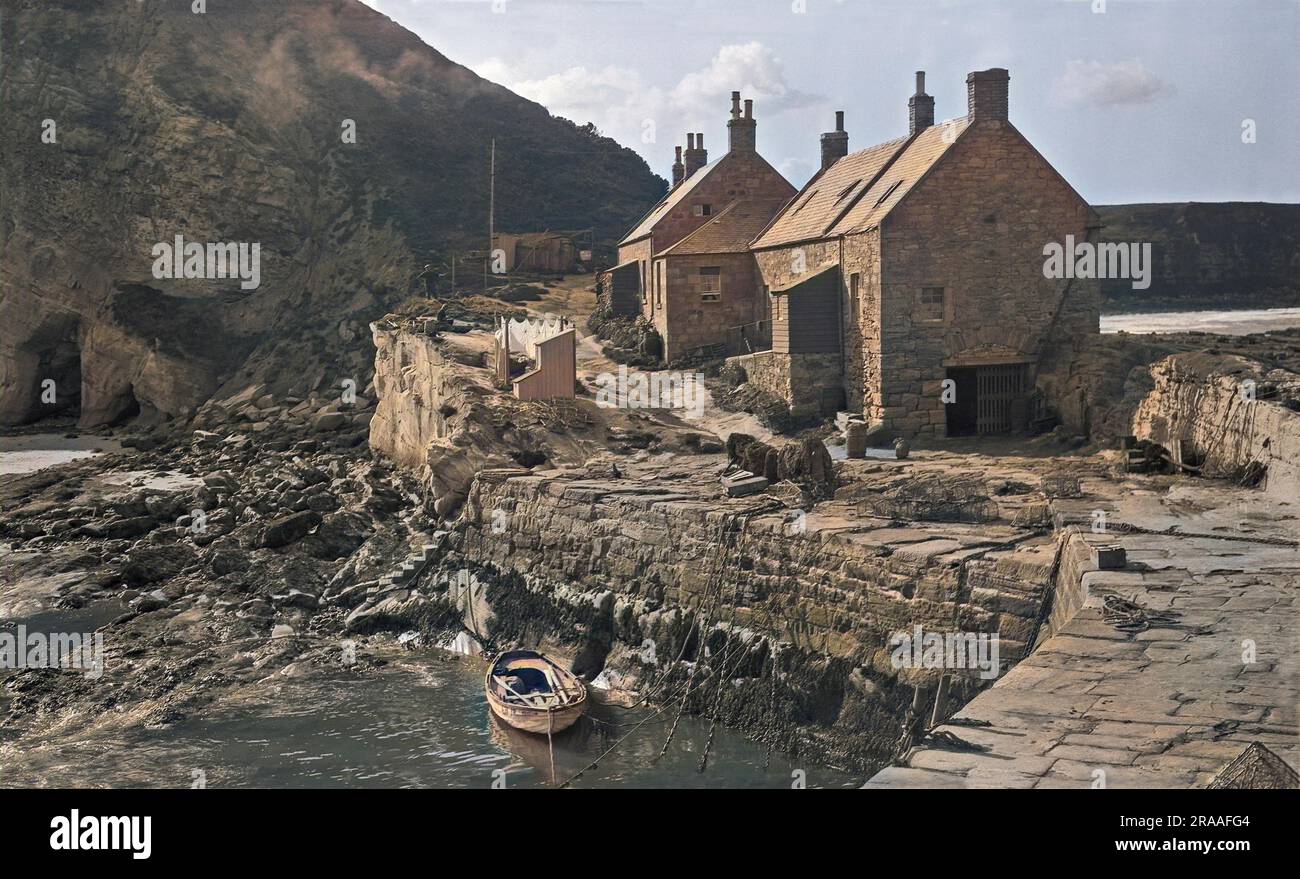 Picturesque coastal scene with a row of cottages at Cove, Scotland ...