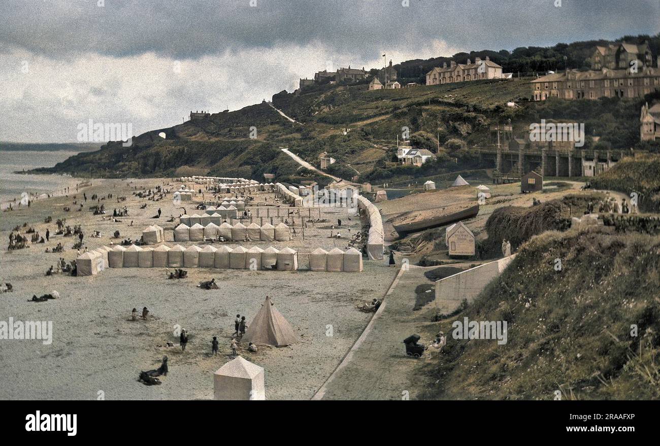People and tents on the beach at St Ives, Cornwall. Date: 1922 Stock ...