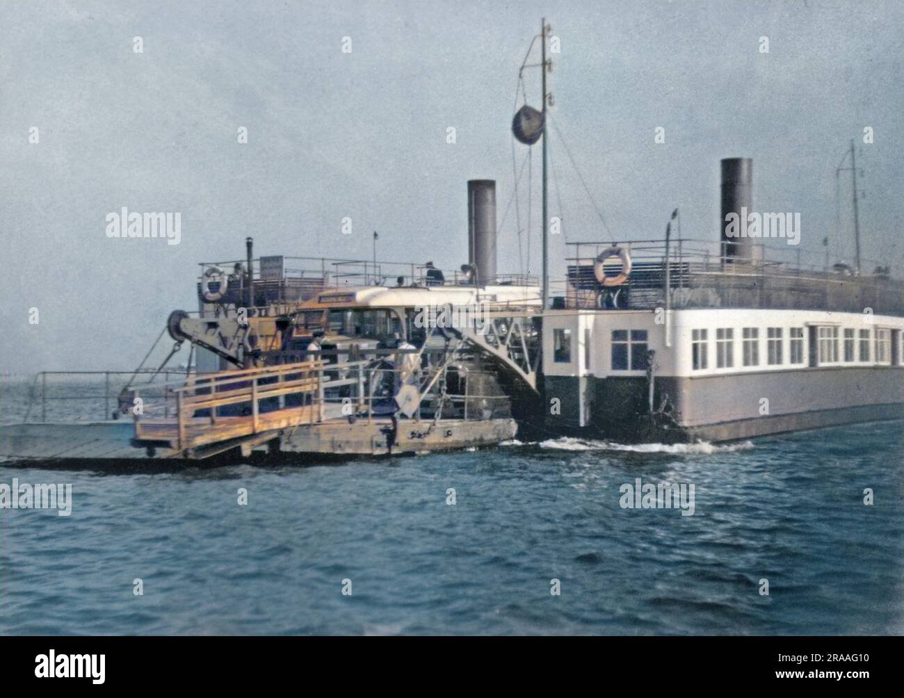 A car ferry with a coach on board Stock Photo - Alamy