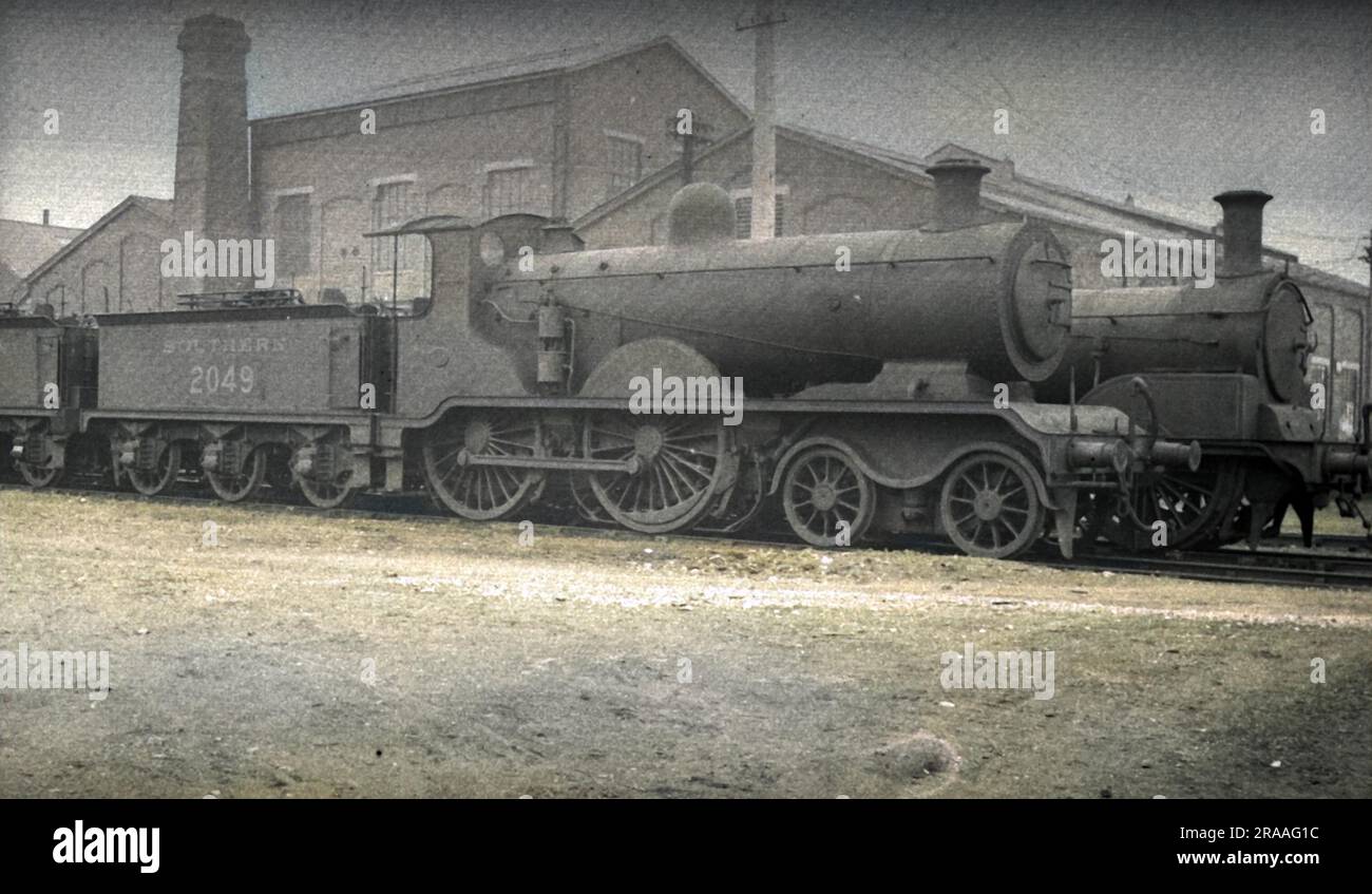 A Southern steam engine with trucks attached Stock Photo - Alamy