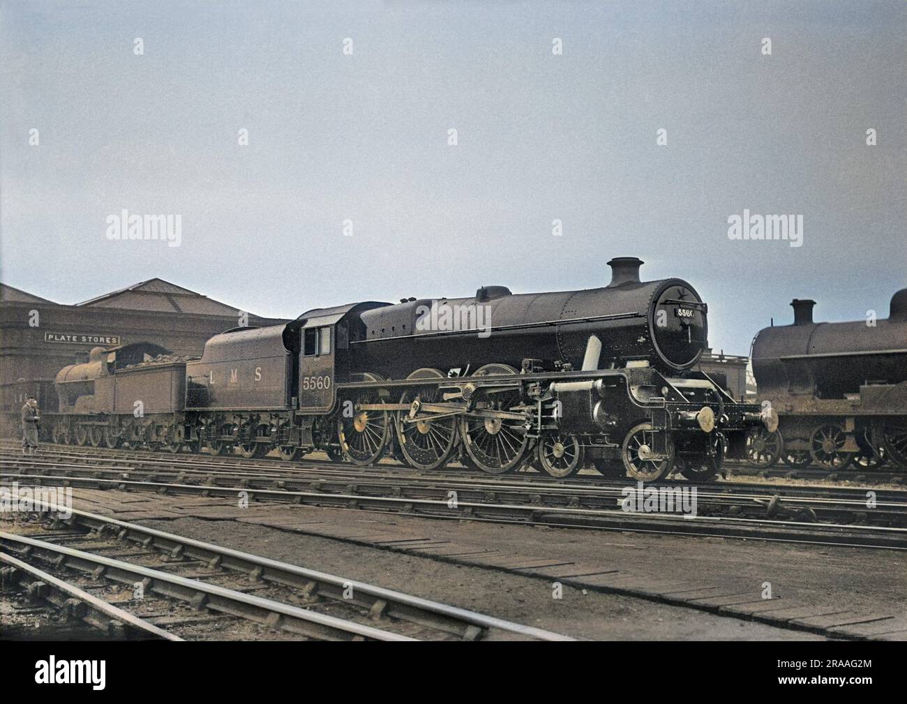 An LMS (London, Midland and Scottish) steam engine on a railway track ...