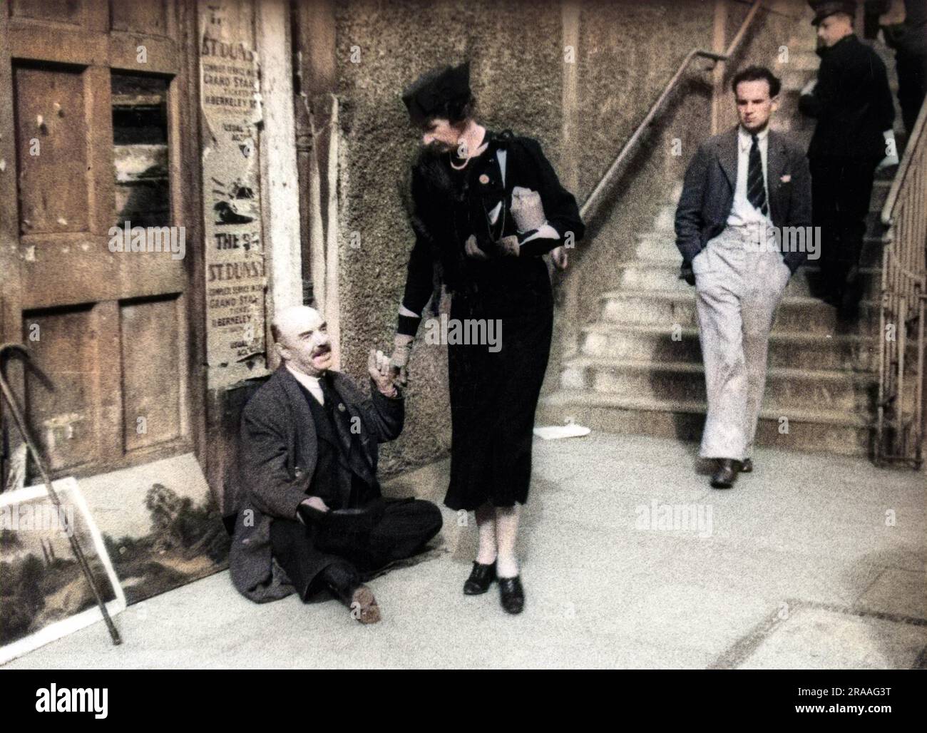 Giving beggar hi-res stock photography and images - Alamy