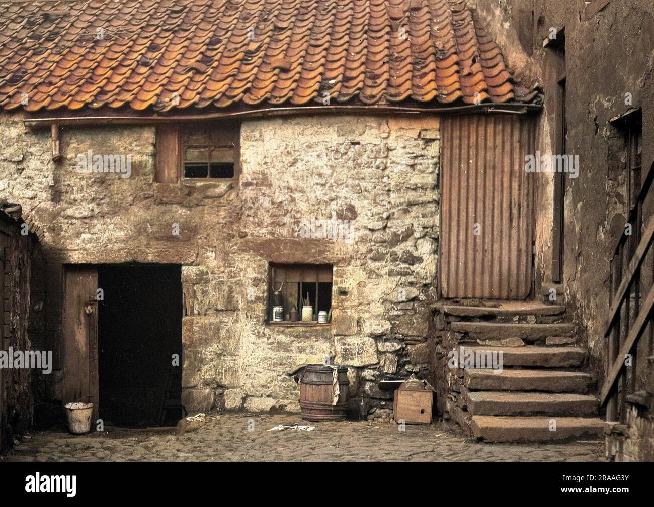 A ramshackle cottage and courtyard, Scotland Stock Photo - Alamy