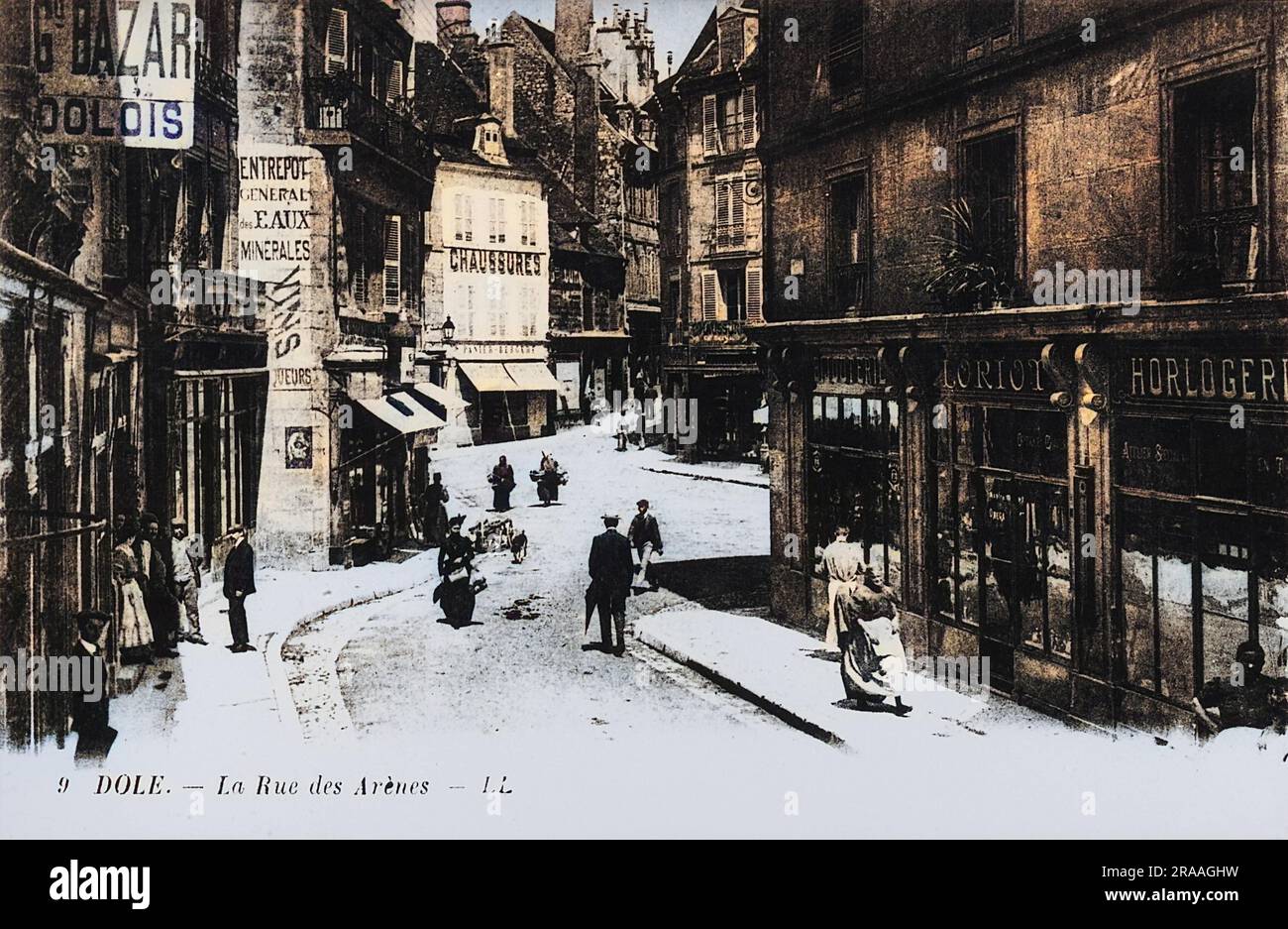 Scene in the Rue des Arenes, Dole, Jura, eastern France, with shops and ...