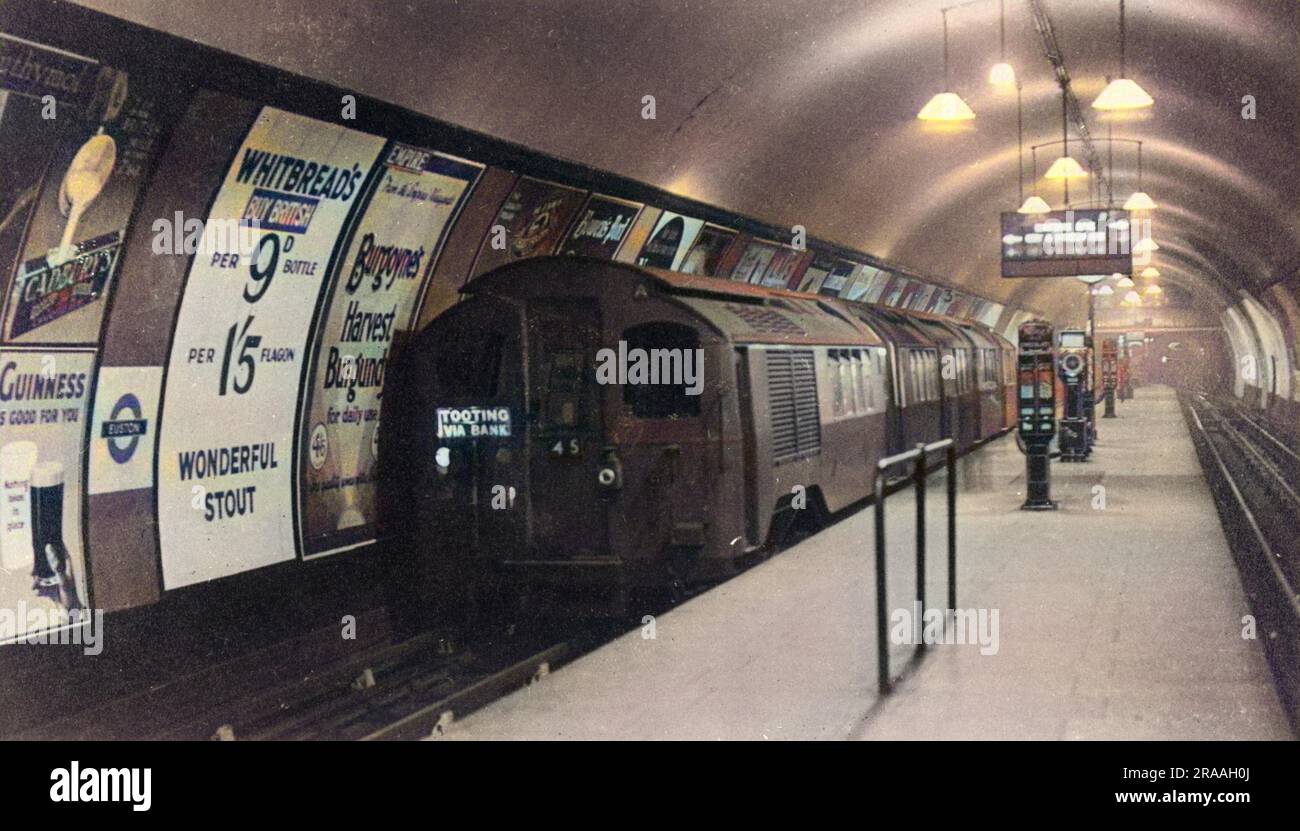 A tube a train at a london underground platform at Euston. Northern ...