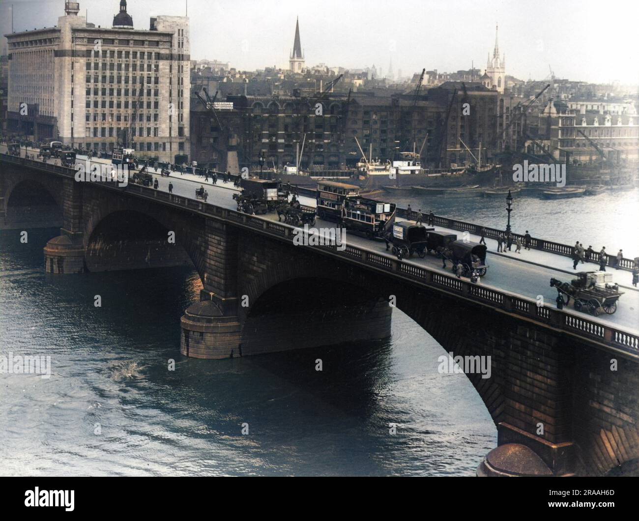 The view of London Bridge from Southbank. The art-deco Adelaide House ...