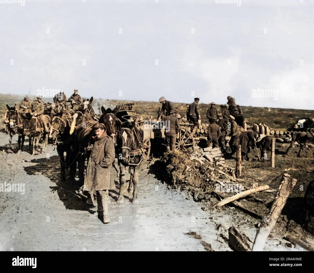 British soldiers unloading heavy ammunition on the Western Front during World War One. Date ...