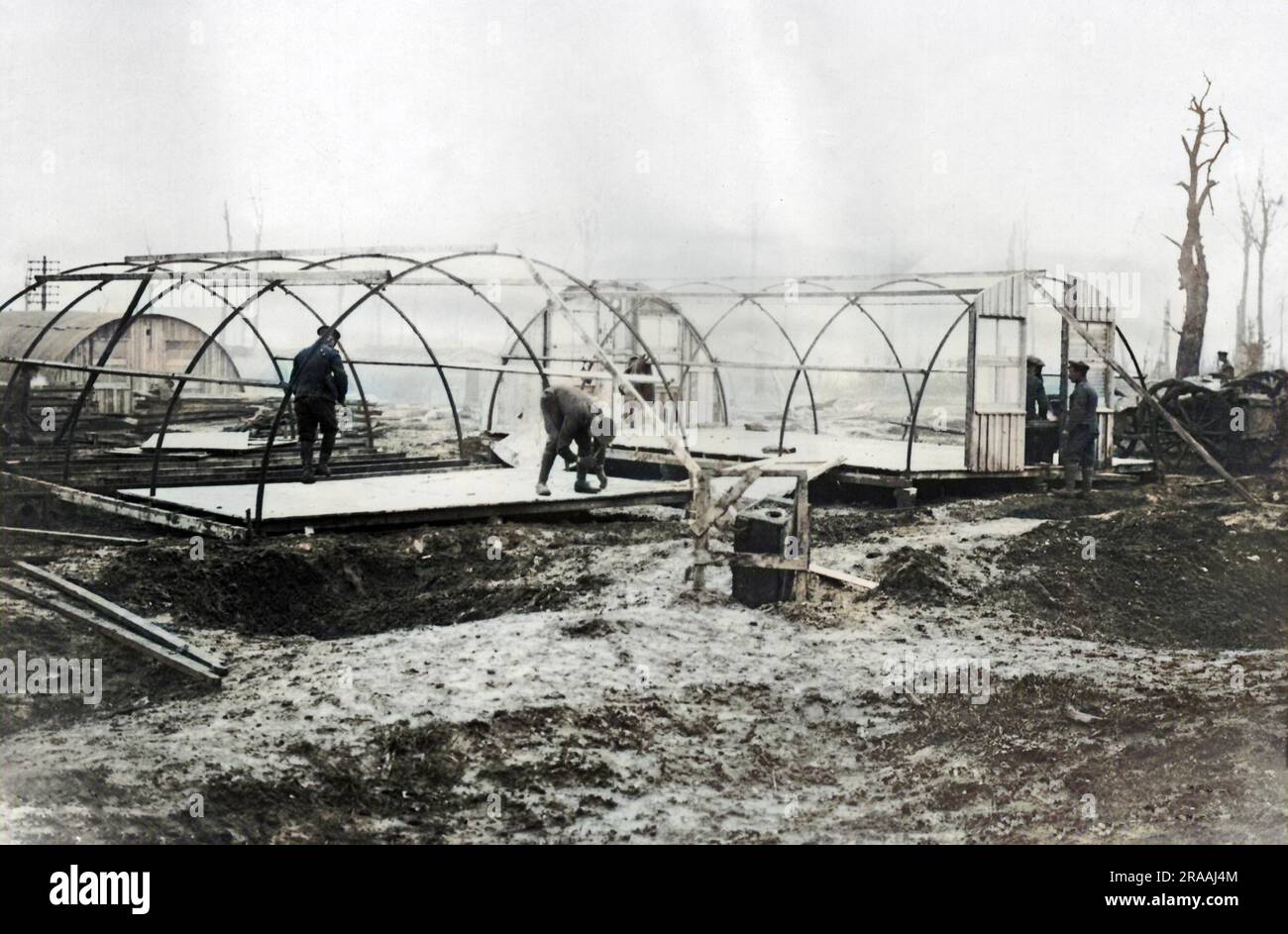British men building Nissen huts for use by troops, on the Western ...