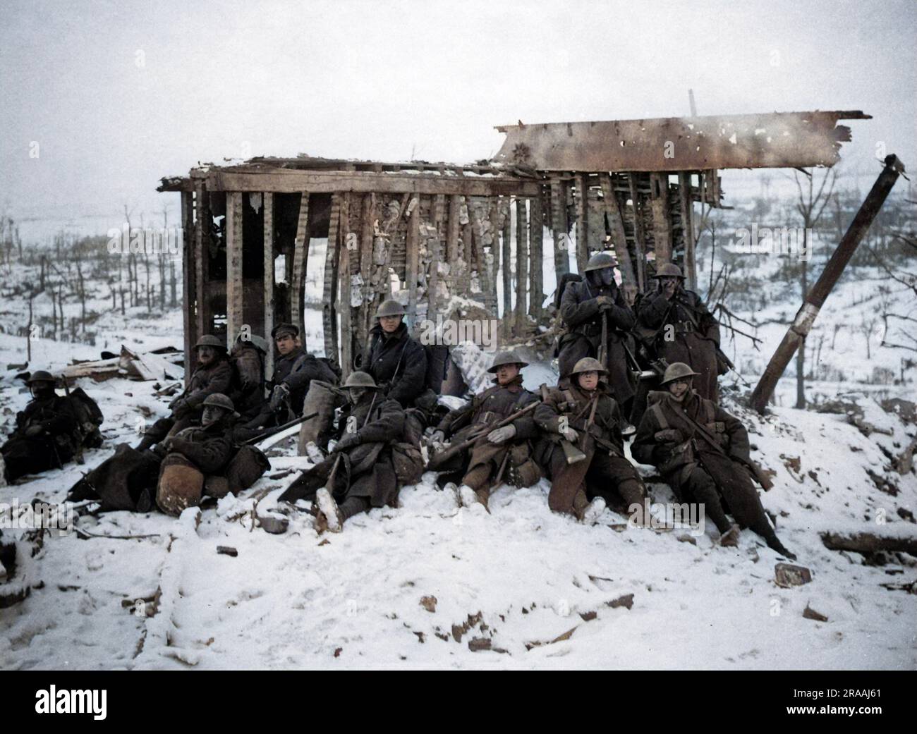 British troops resting in the snow on their way to the trenches, on the ...
