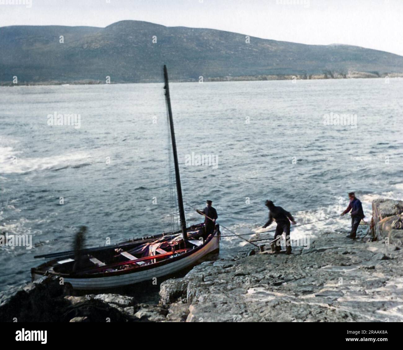 Fishermen returning from Barra Head on the island of Barra, Outer ...
