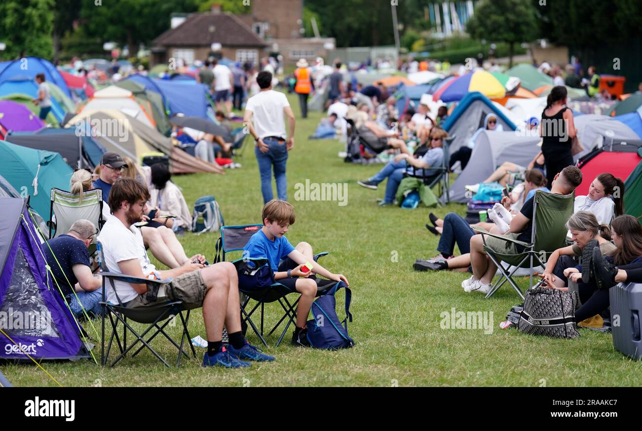 Spectators queue outside at the All England Lawn Tennis and Croquet ...