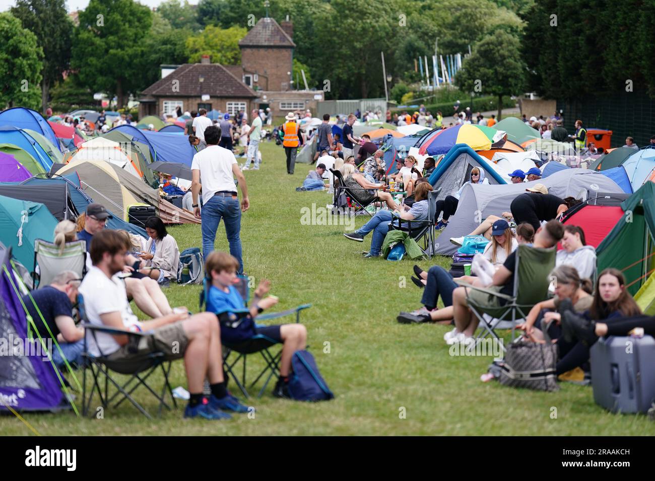 Spectators queue outside at the All England Lawn Tennis and Croquet ...