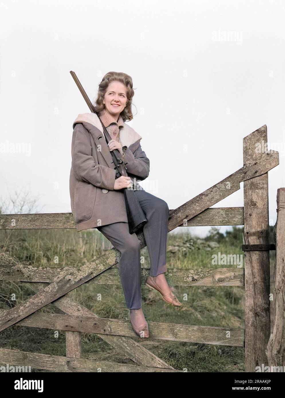 Woman rifle sitting on hi-res stock photography and images - Alamy