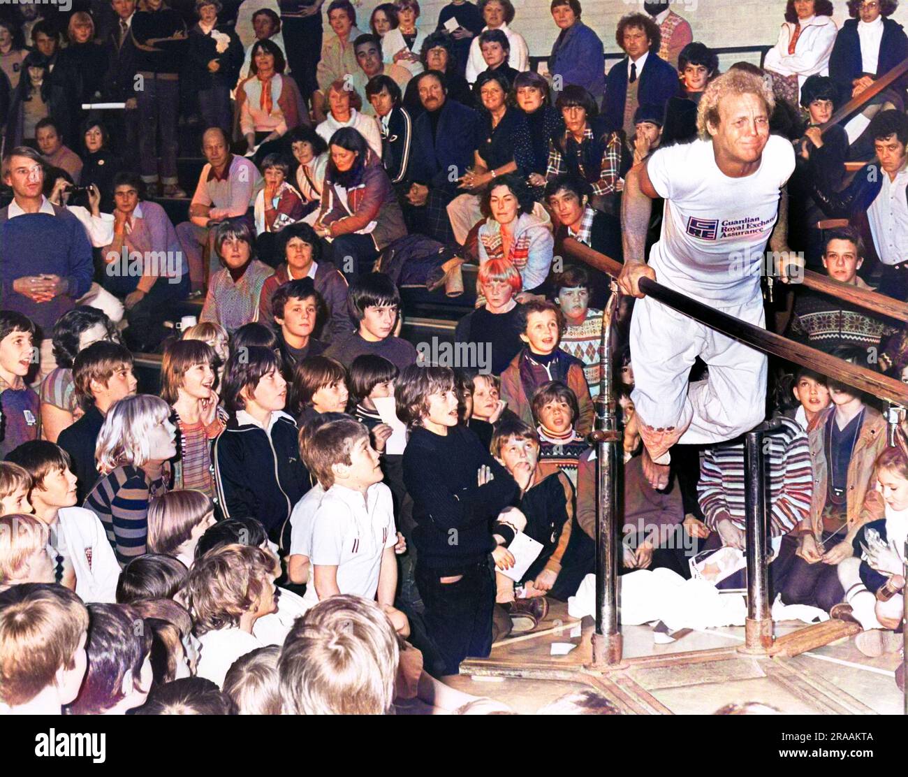 Brian Jacks (b. 1946), British judoka (judo practitioner) and champion, demonstrating arm dips ...