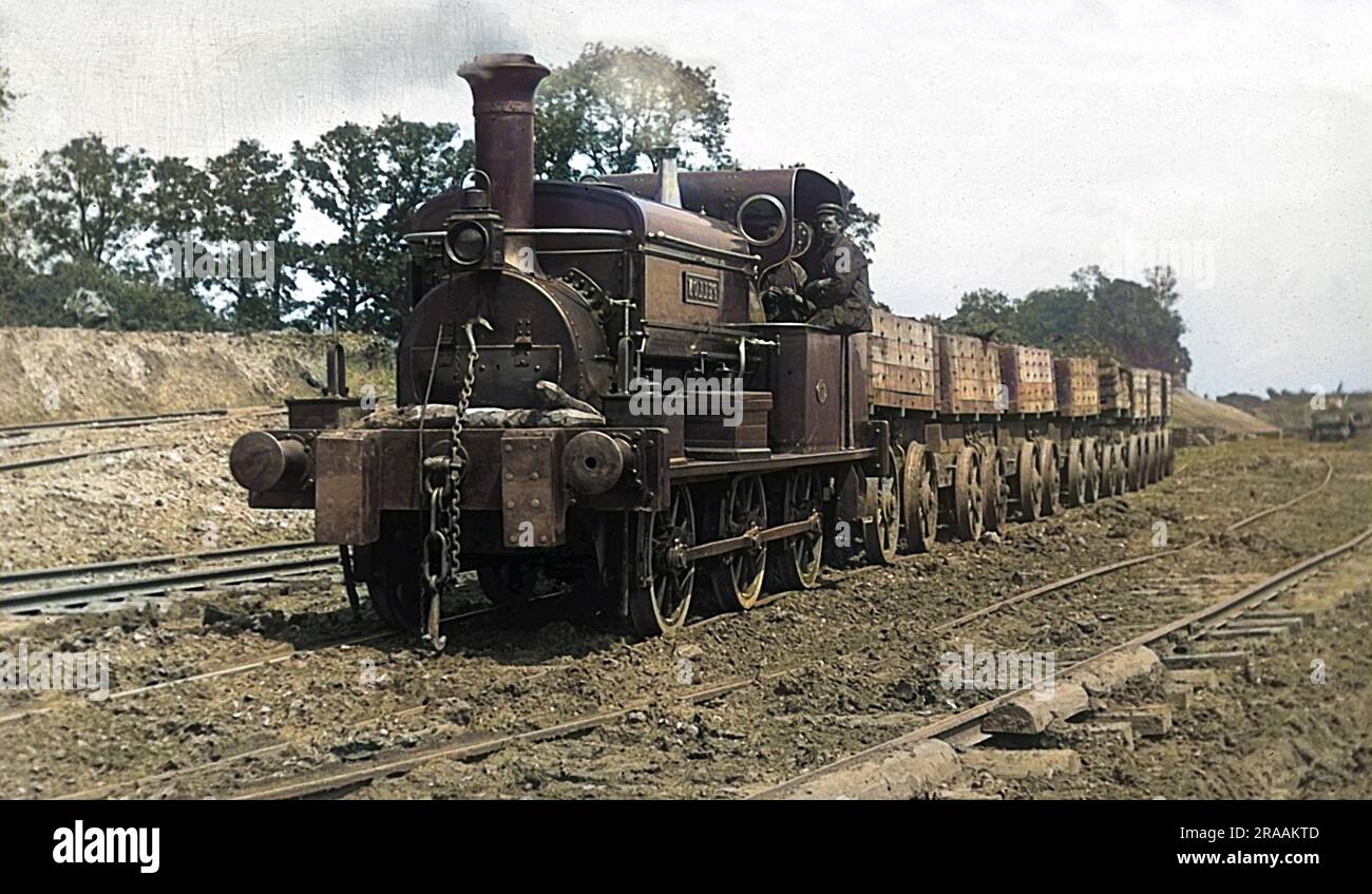 A contractor's Locomotive, removing cleared earth and rubble from the ...