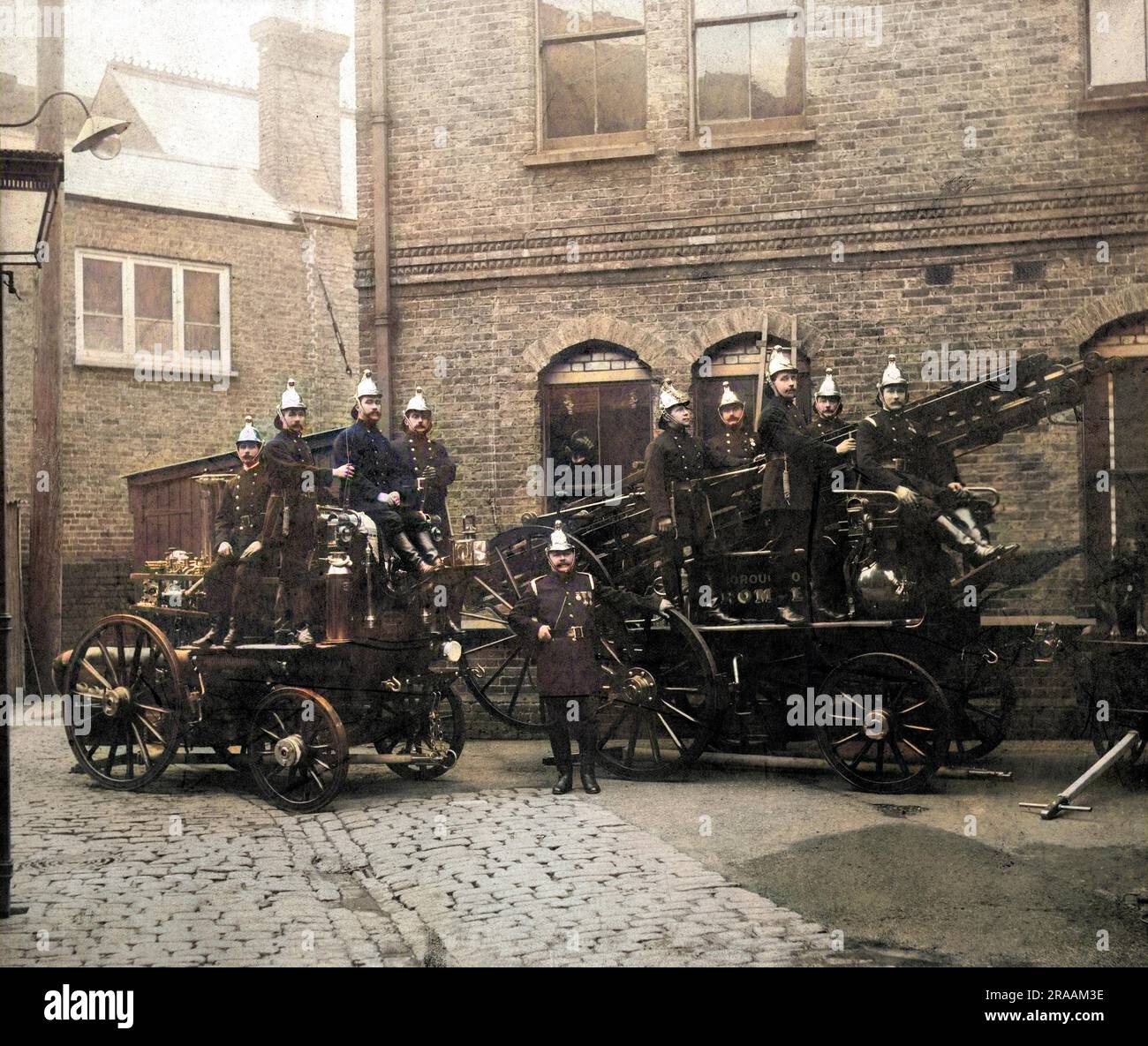 Firefighters of the London Borough of Bromley with two fire engines in ...