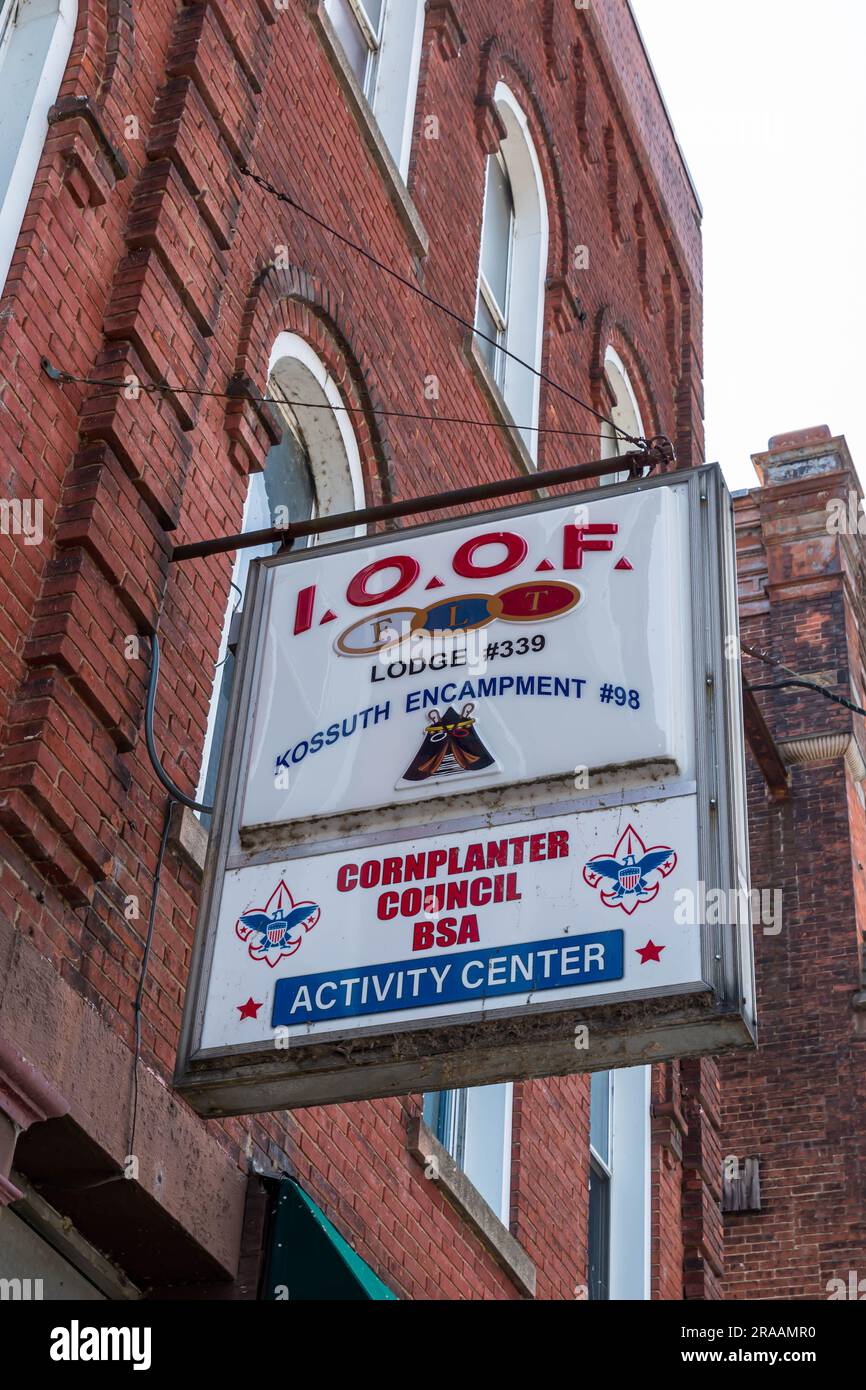 A brick building with two signs attached to it in Warren, Pennsylvania ...
