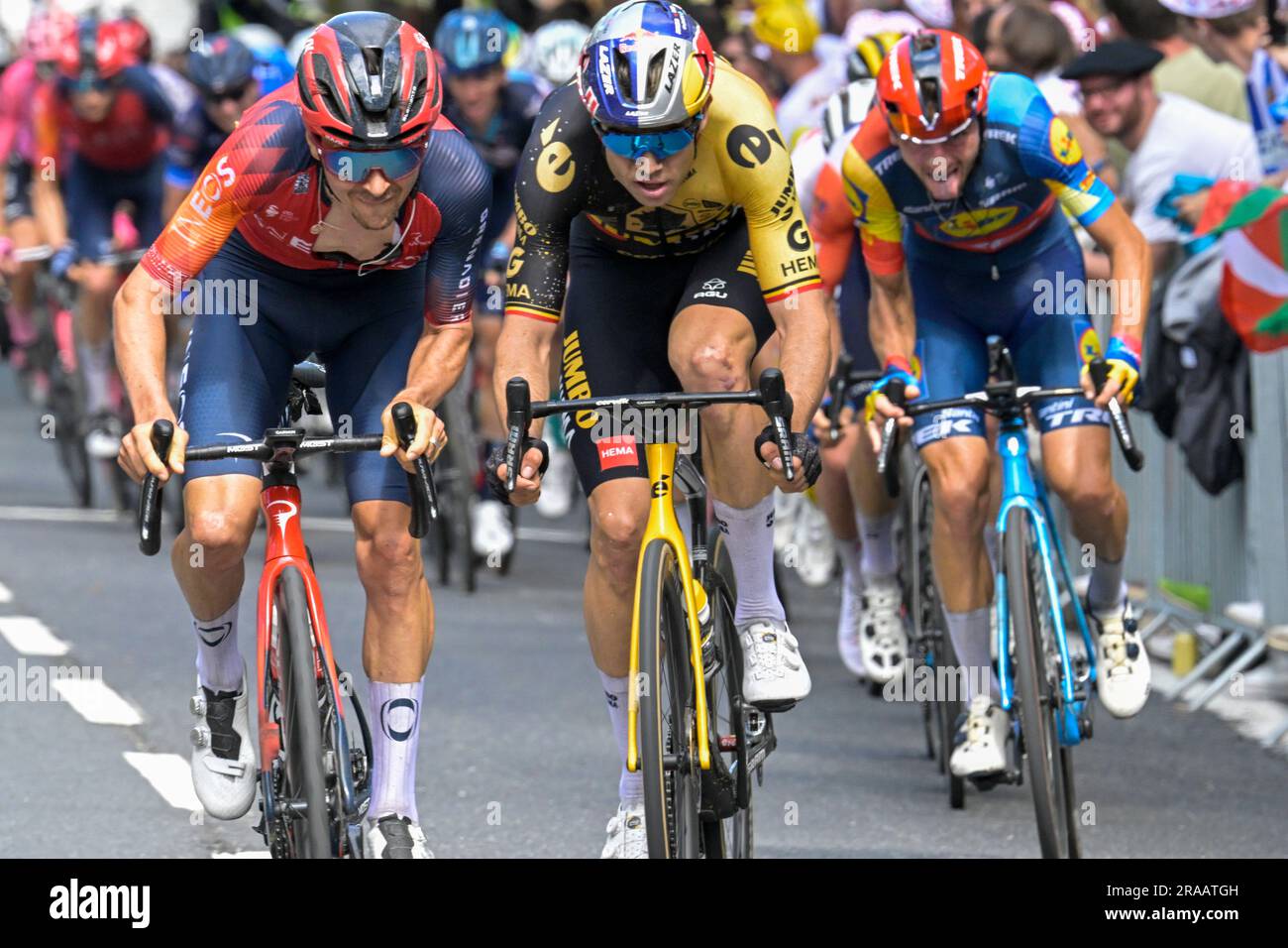 Britain's Thomas Pidcock, left, leads the limb before Belgium's Wout ...
