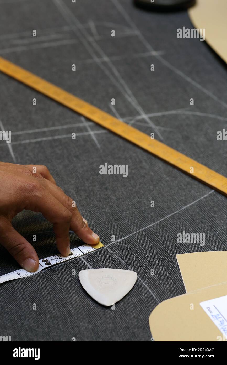 Tailor scissors tape measure suit hi-res stock photography and images ...