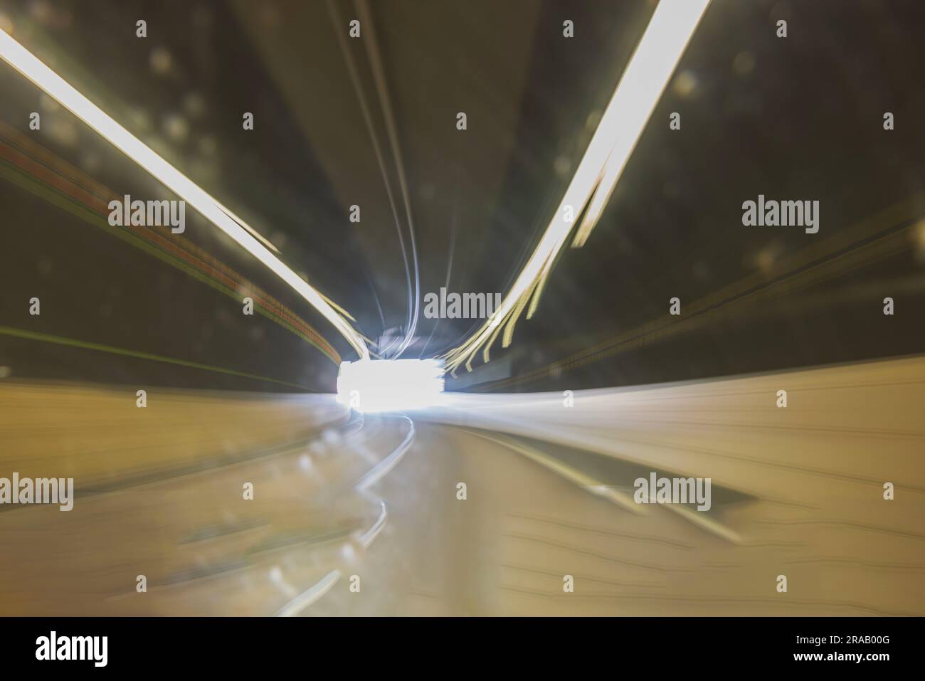 Beautiful view of exit from tunnel with defocused colorful tracers of ...