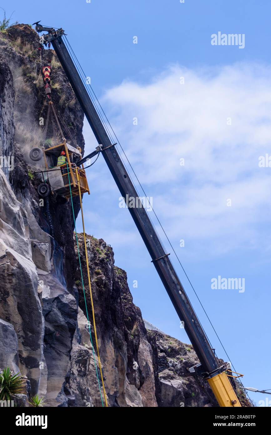 Work cage suspended from crane hi-res stock photography and images - Alamy