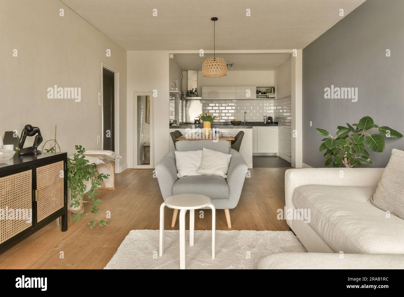 a living room with couches, chairs and a coffee table in the middle ...