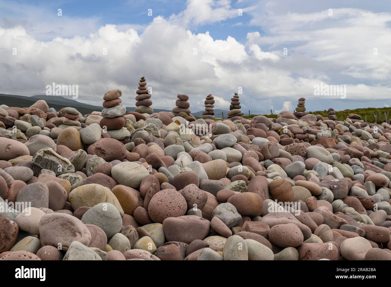 Stone stacks on pebble beach, Mallaranny, County Mayo, Ireland Stock ...
