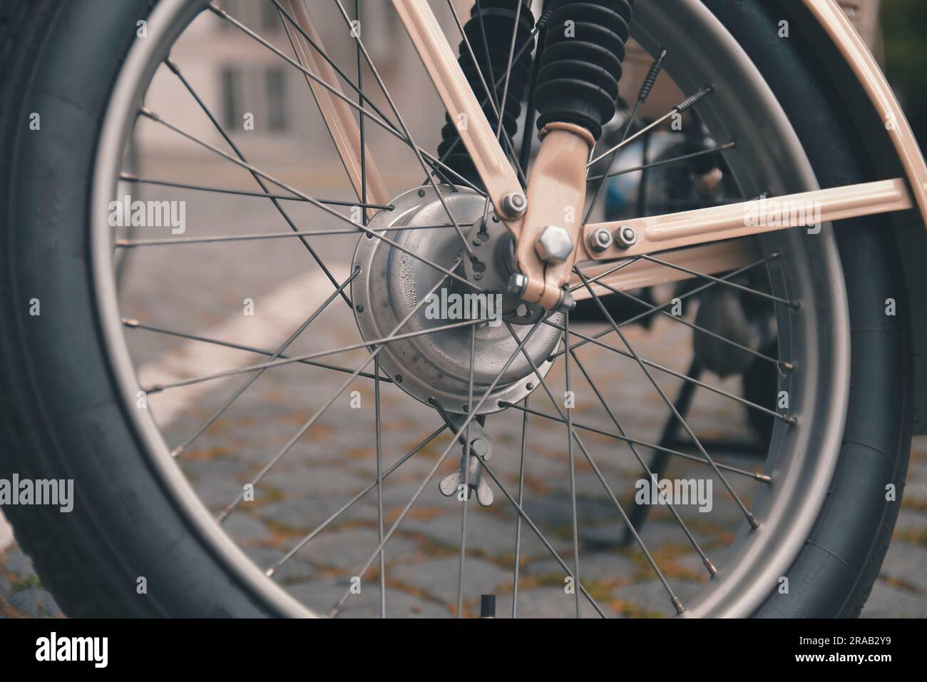 Retro motorcycle wheel. Old laced motorcycle wheel Stock Photo - Alamy