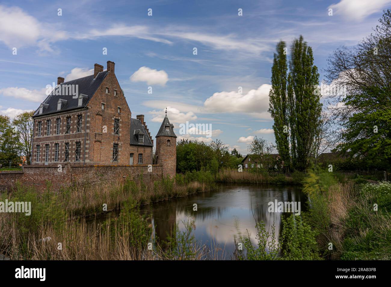 Marketplace of the city Moeskroen, Mouscron België. Blue sky and church ...