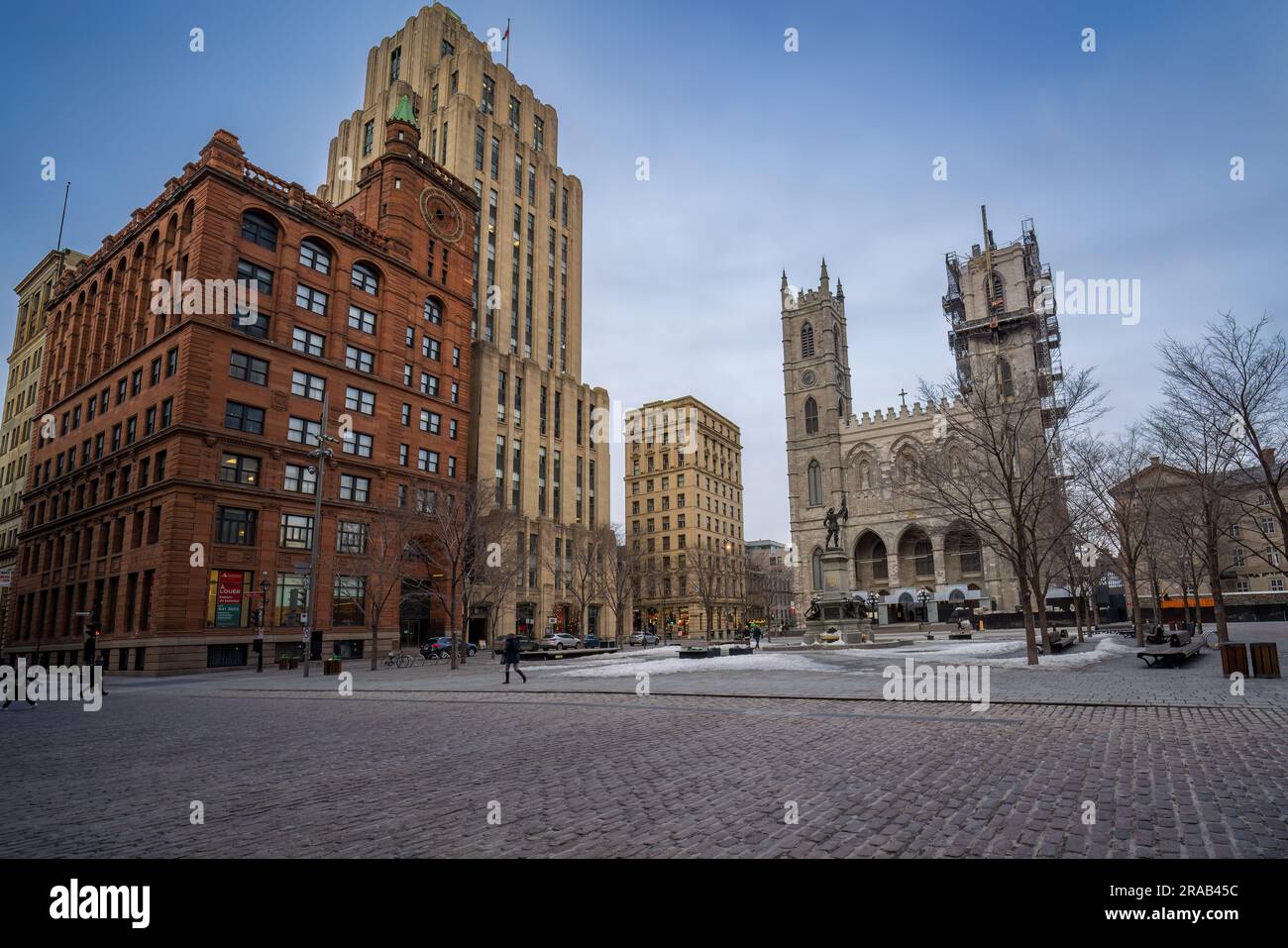 Montreal's most famous square, Place d'Armes, in the old port of ...