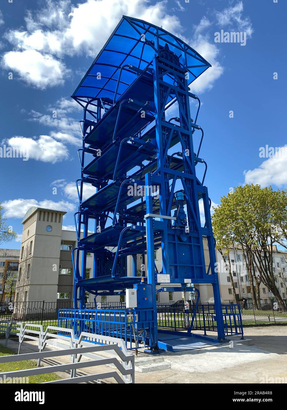 Electric carousel parking system allowing more cars to park multiple ...